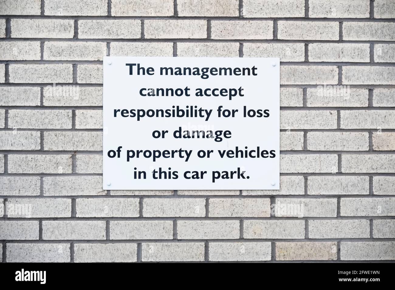 Car park users do so at own risk sign Stock Photo - Alamy Car park users do so at own risk sign Stock Photo - Alamy