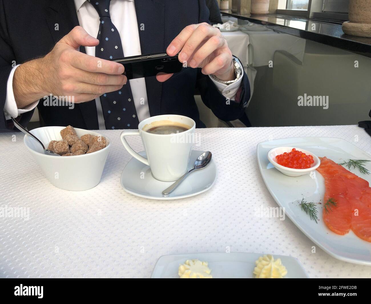Man eating dinner suit hi-res stock photography and images - Alamy