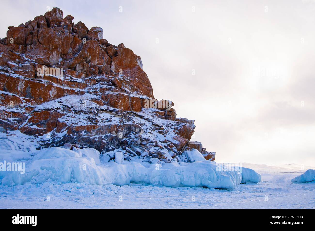 Unusual snow island coast in winter Stock Photo - Alamy