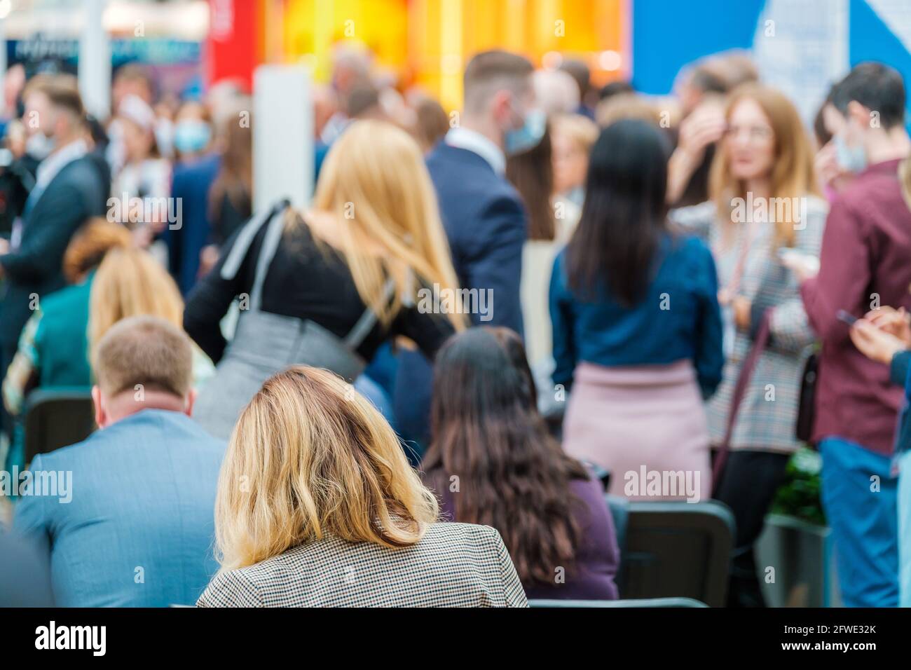 Businesspeople listening speaker during conference hi-res stock ...
