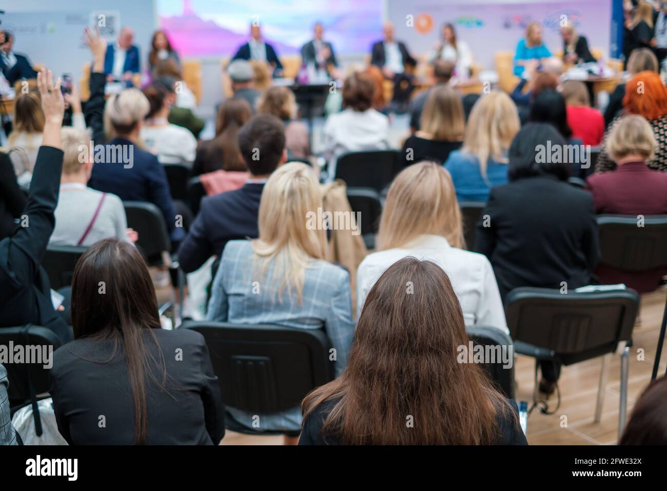 Businesspeople listening speaker during conference hi-res stock ...