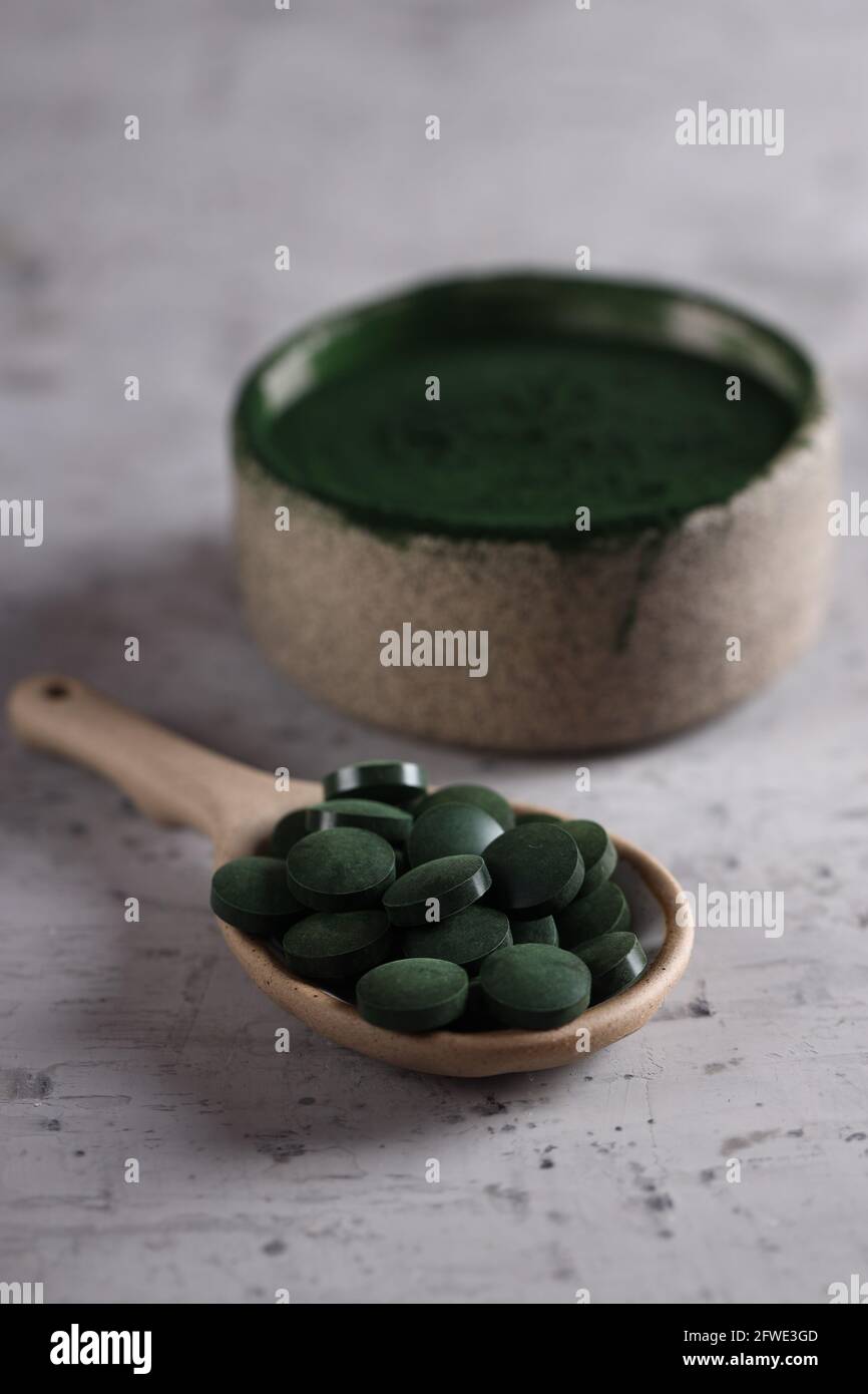 spirulina powder and superfood tablets Stock Photo - Alamy