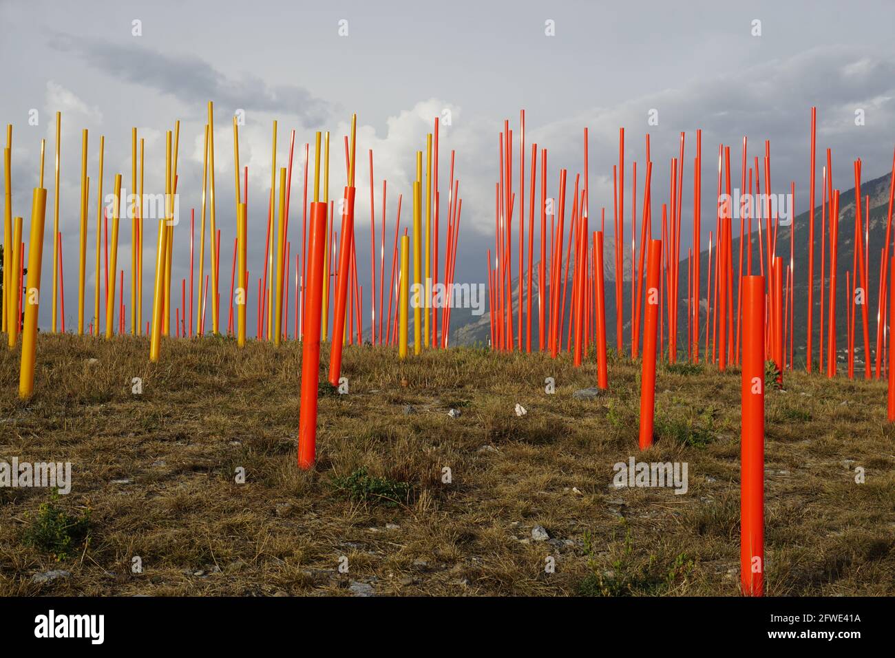 colorful plastic sticks/poles decorating a roundabout in embrun, france ...