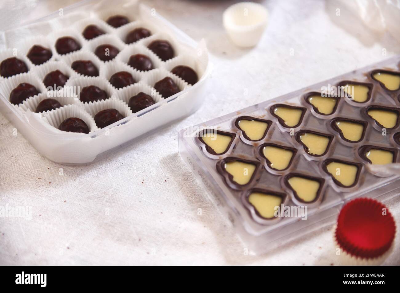 Chocolatier mixing melted liquid chocolate hi-res stock photography and ...