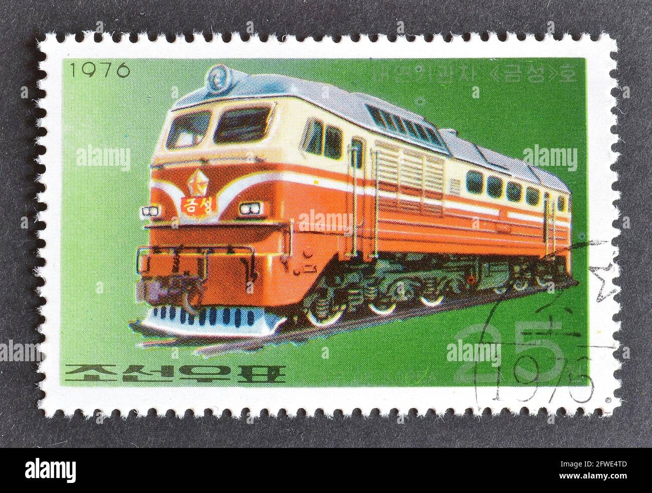 Cancelled postage stamp printed by North Korea, that shows Kumsong ...