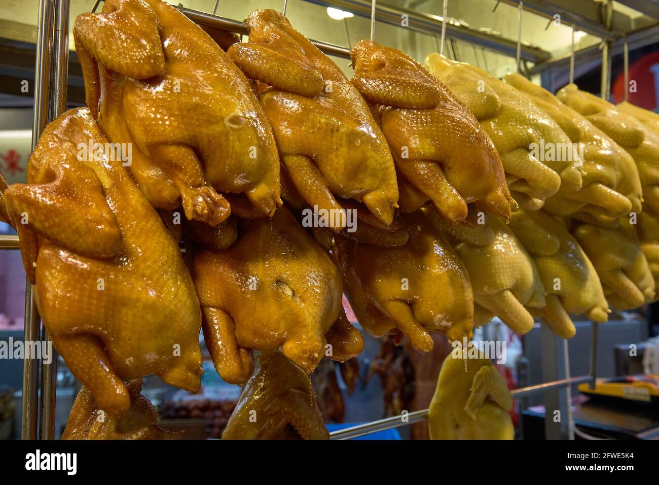 Selections of roast and steamed chickens at a food stall in Tai Yuen ...