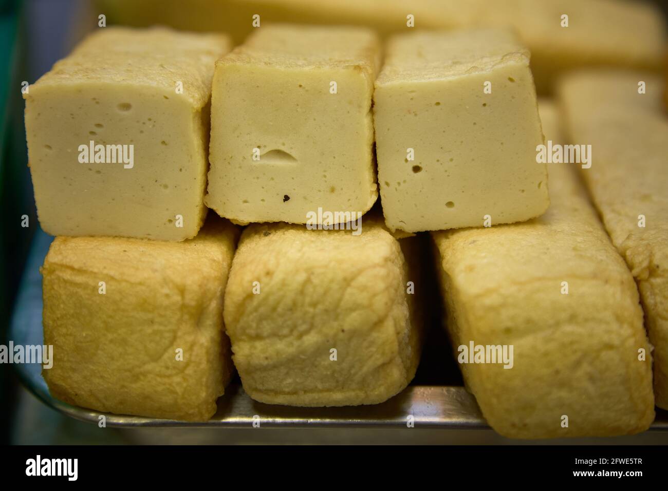 Tofu products for sale at a food stall in Tai Yuen market in Hong Kong ...