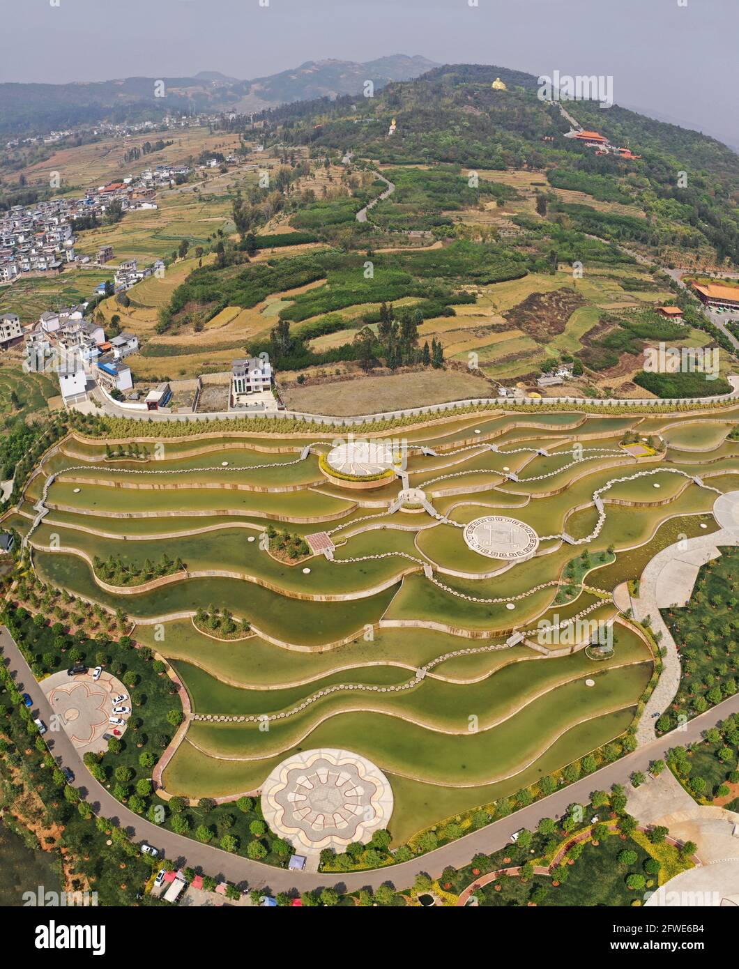 Aerial view of artificial rice terraces in Jinpingshan park in Mile ...