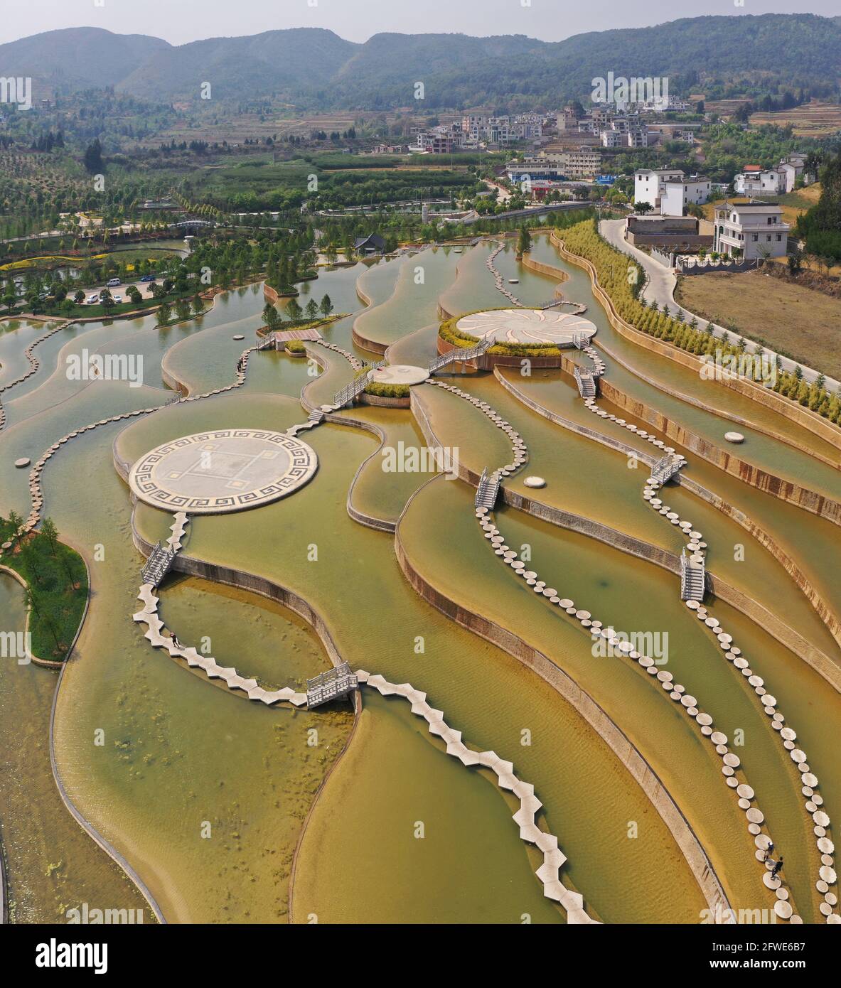 Aerial view of artificial rice terraces in Jinpingshan park in Mile ...