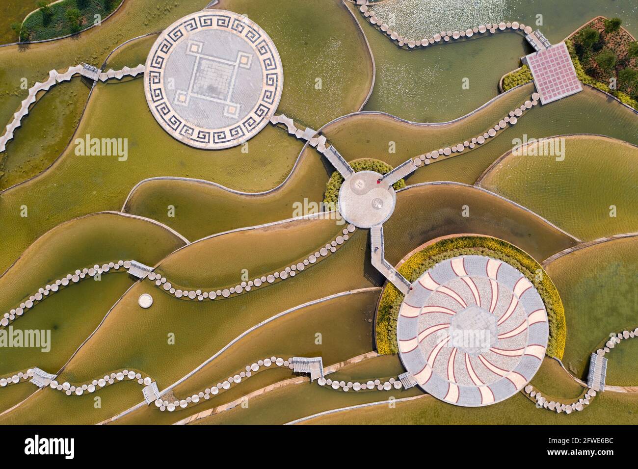 Aerial view of artificial rice terraces in Jinpingshan park in Mile ...