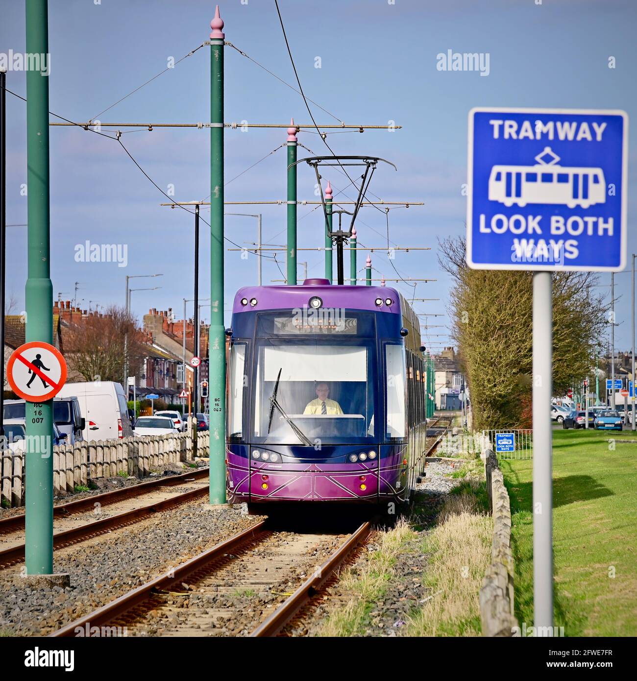 Tram travelling along track in Fleetwood Stock Photo - Alamy
