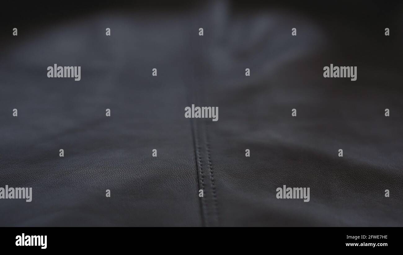 Abstract dark leather jacket texture hi-res stock photography and ...