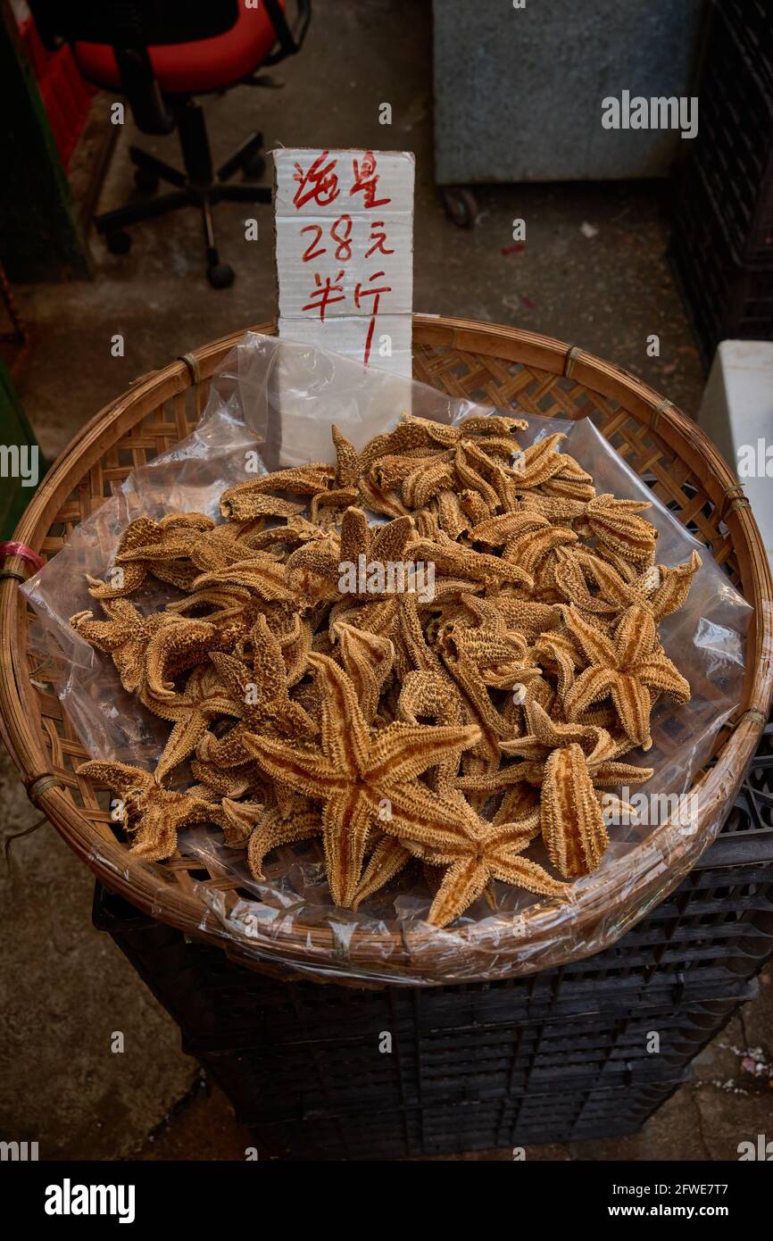 Close up details of a basketful of starfish taken at fresh produce ...