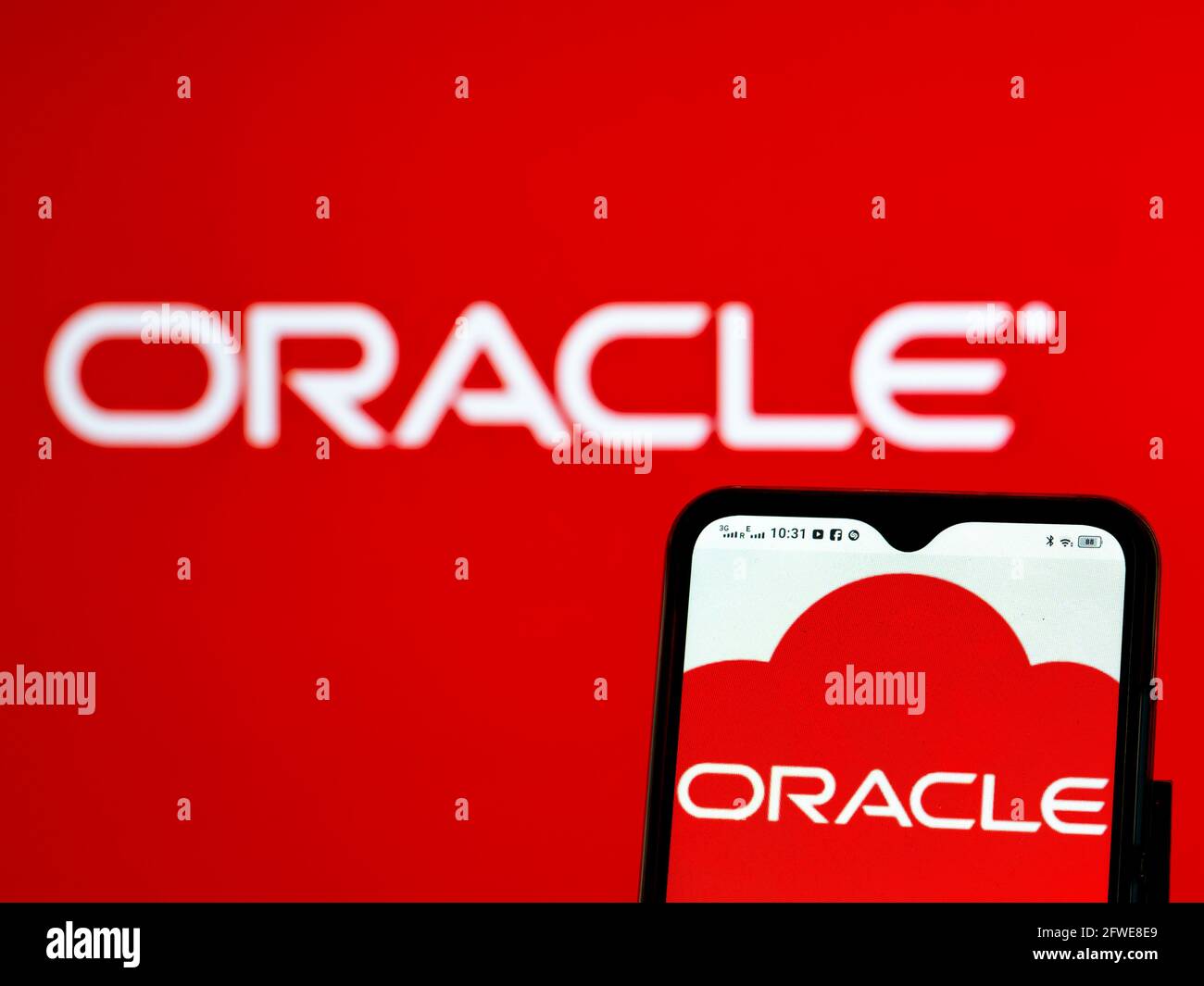 In this photo illustration Oracle Corporation logo seen displayed on a ...