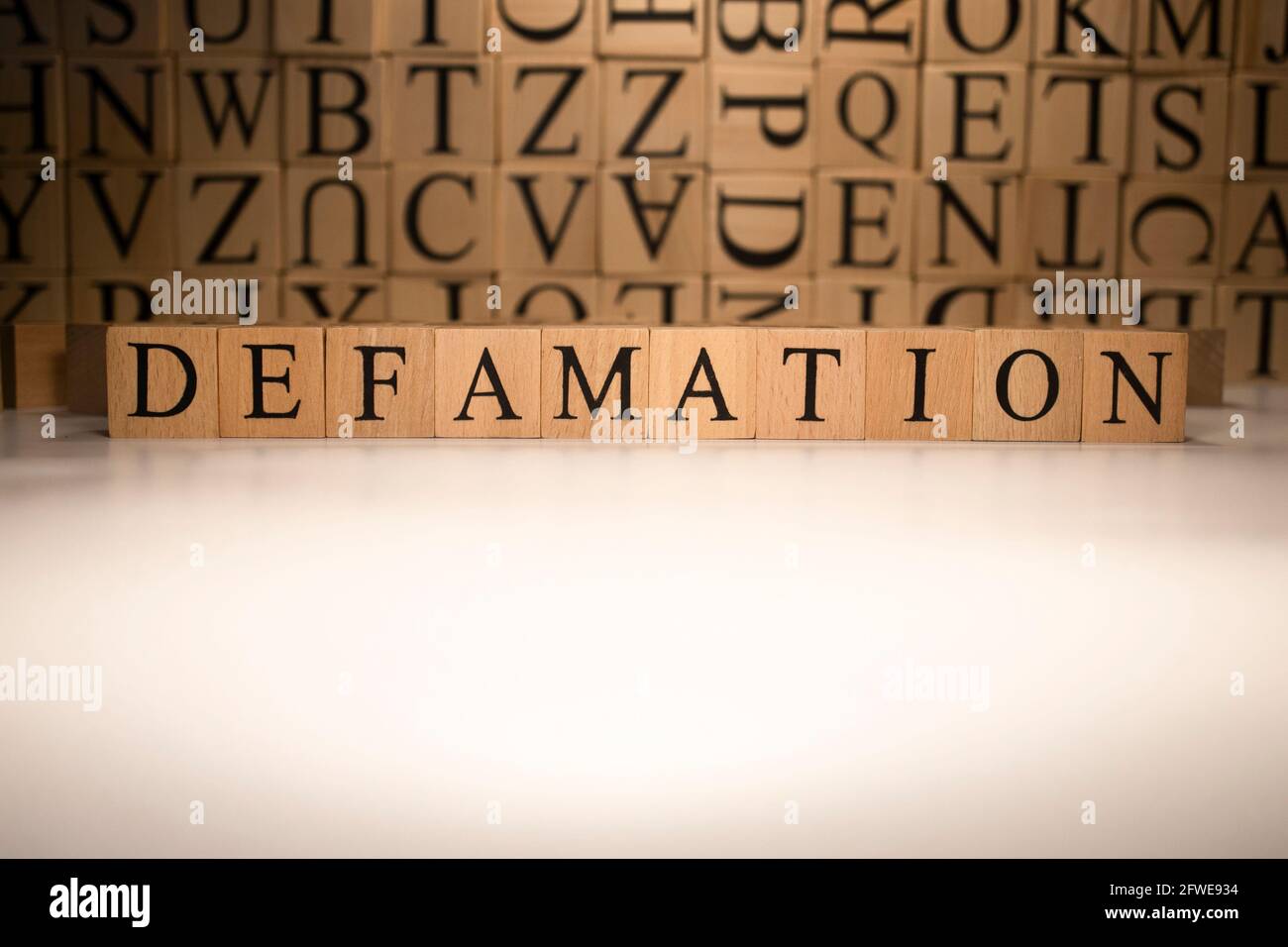 The word defamation end was created from wooden cubes. Countries and ...