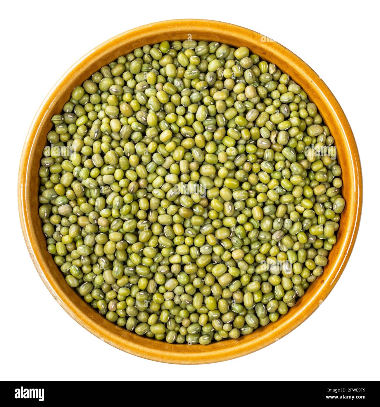 top view of green mung bean in round bowl cutout on white background ...