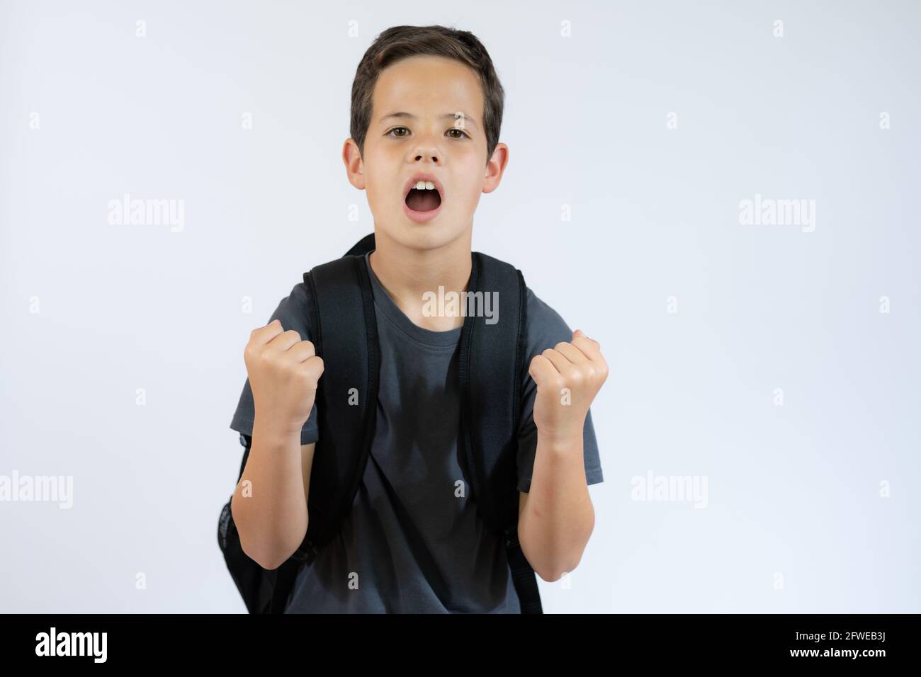 Happy expressive child isolated on white. Back to school. Happy win ...