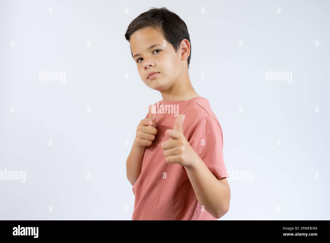 Portrait of cheerful boy with good idea - isolated over white ...