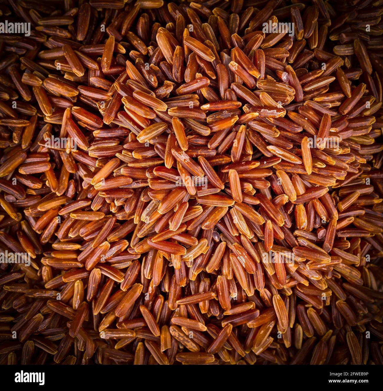 The close up texture of raw brown rice. Background Stock Photo - Alamy