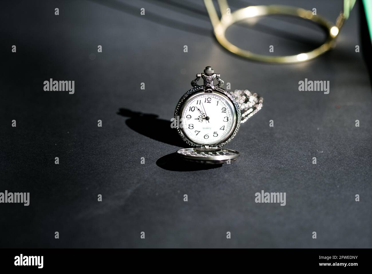 Pocket watch with a wolf head design closeup. Selective Focus Stock ...