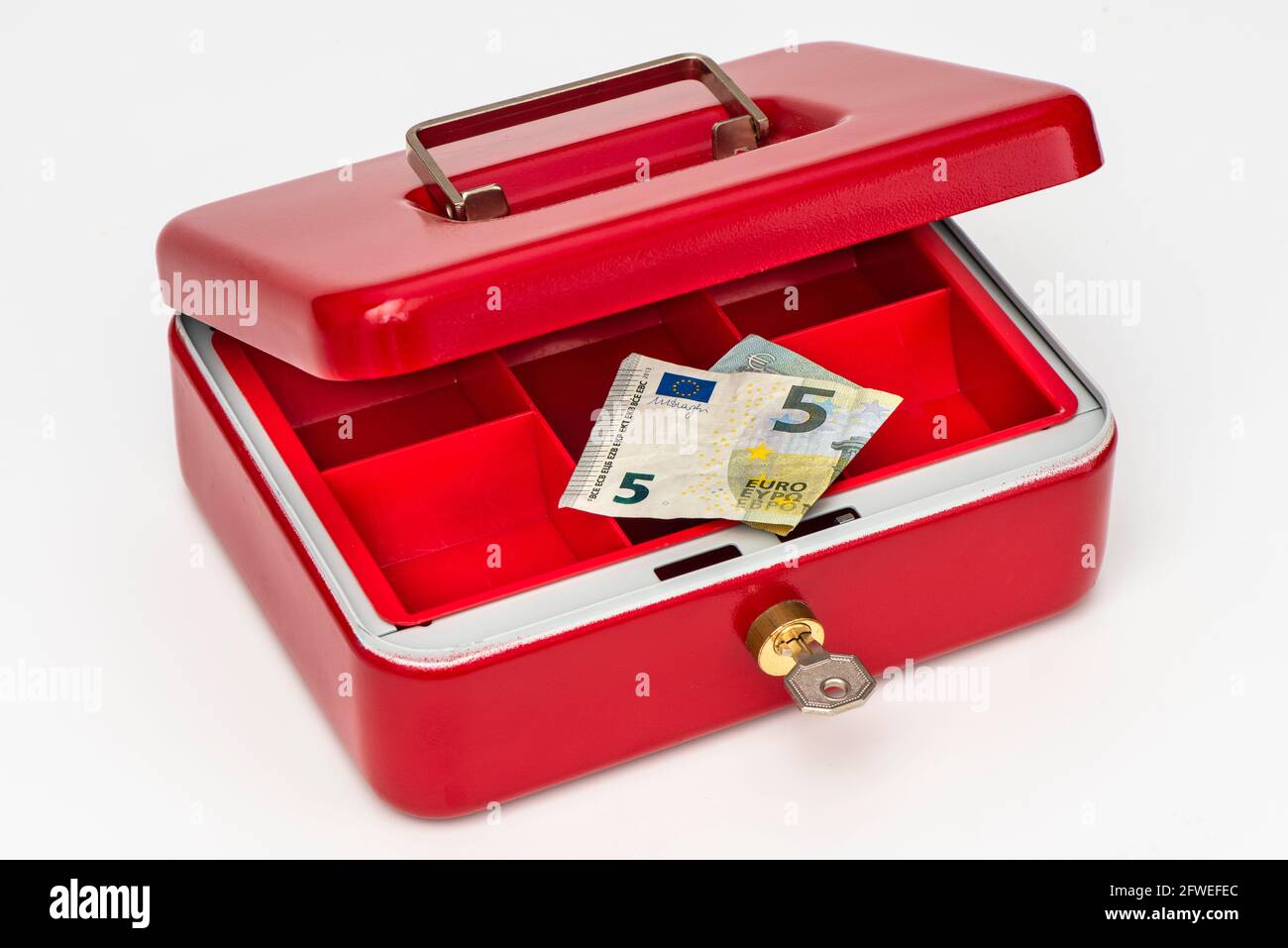 Cash box with little cash Stock Photo - Alamy
