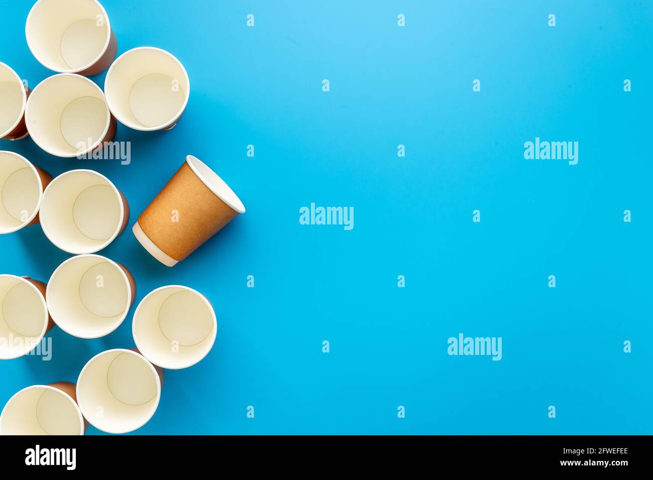 Layout of coffee paper cups. Overhead view Stock Photo - Alamy
