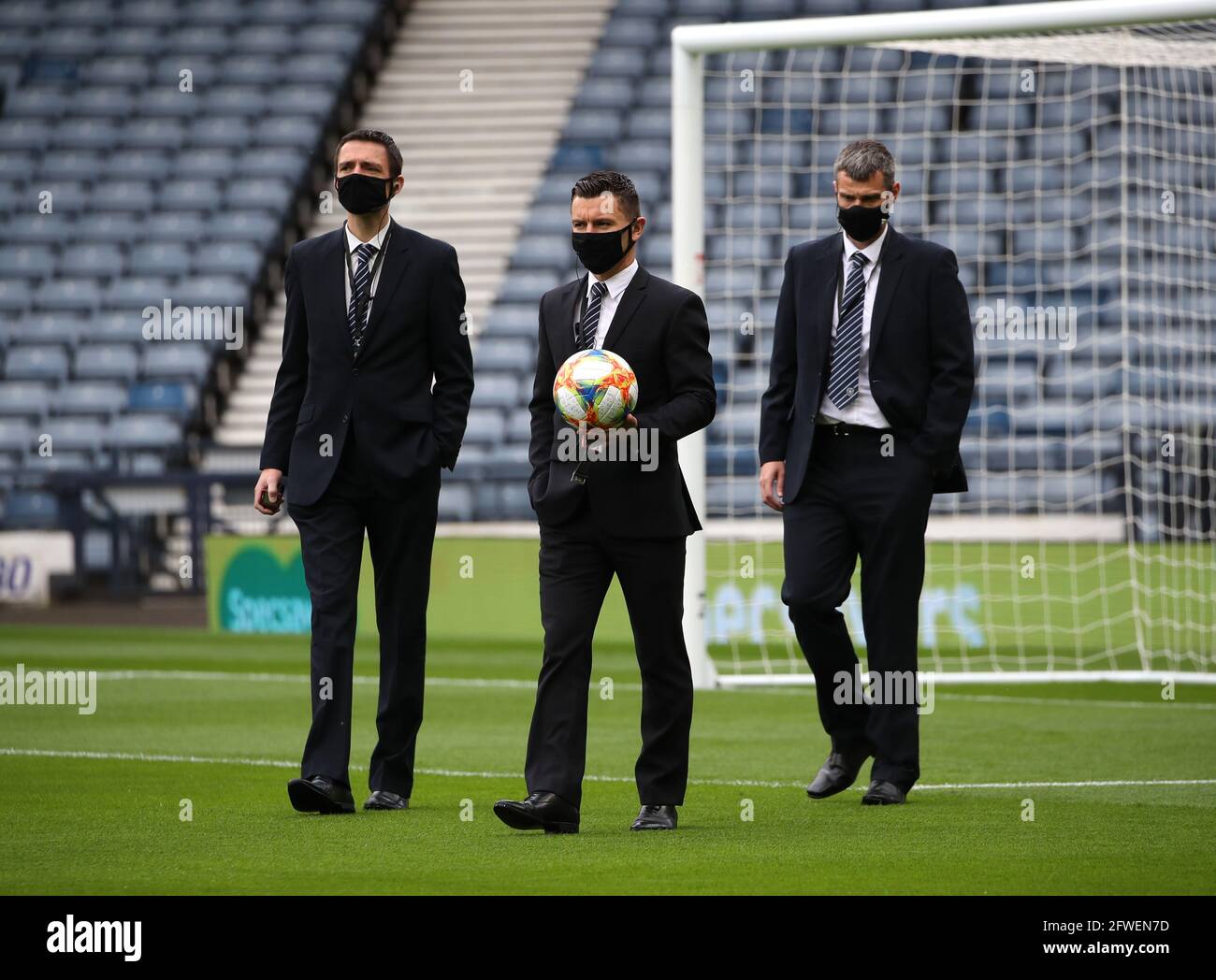 Referee Nick Walsh (centre) and officials before the Scottish Cup final ...