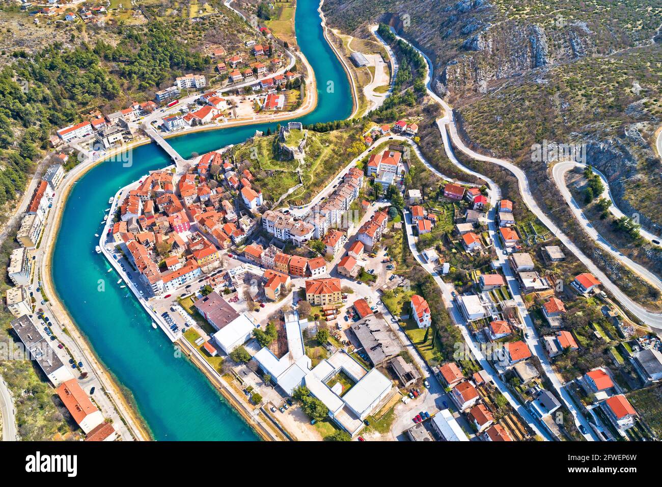 Town of Obrovac and Zrmanja river canyon panoramic aerial view ...