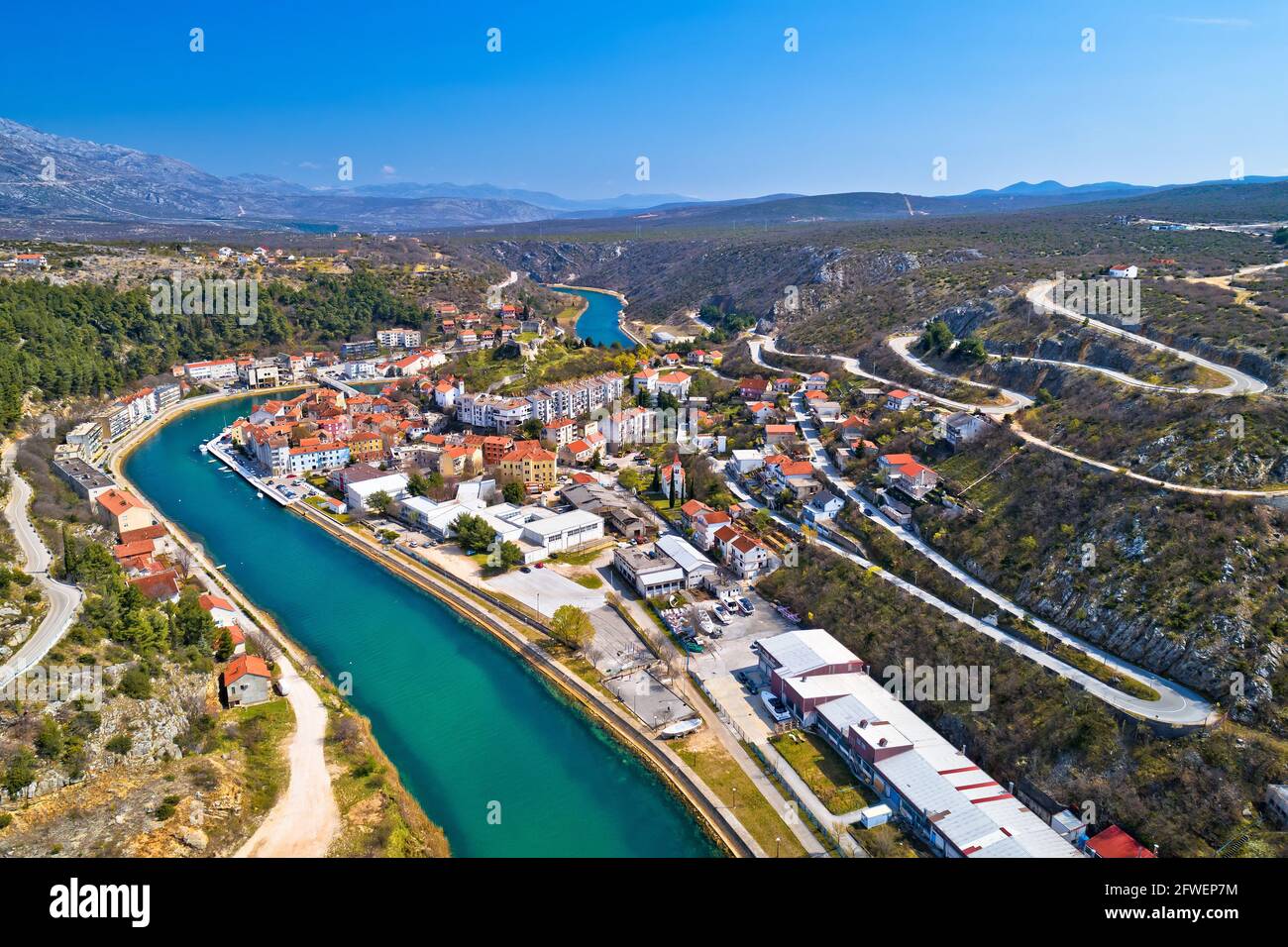Town of Obrovac and Zrmanja river canyon panoramic aerial view ...