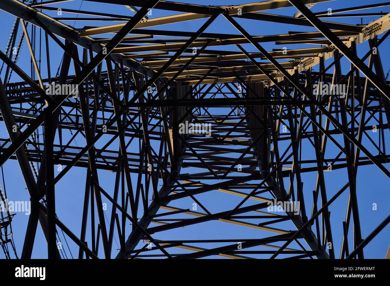 The structure of the power mast seen from the inside Stock Photo - Alamy