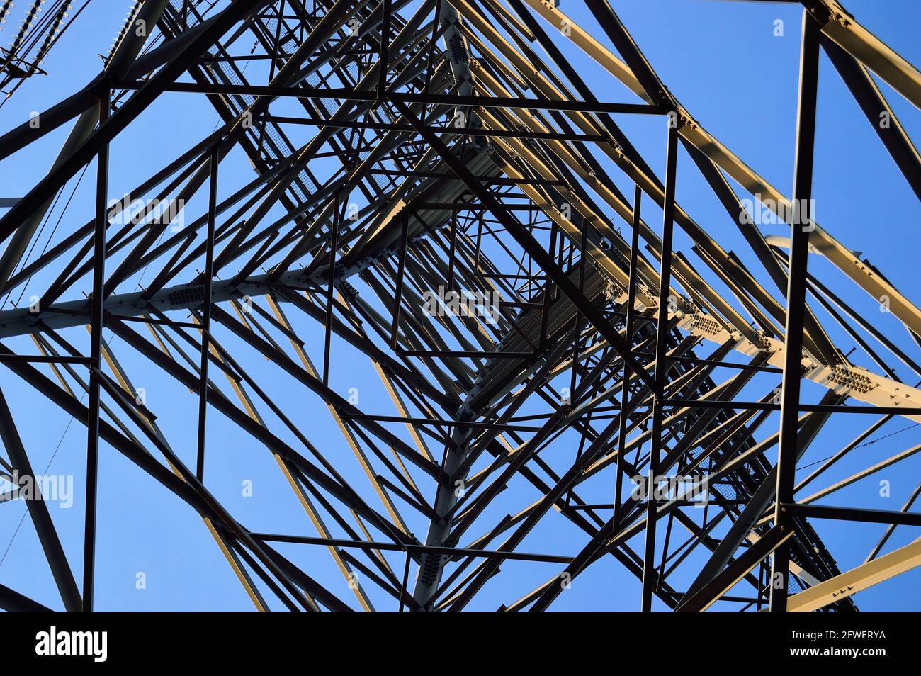 The structure of the power mast seen from the inside Stock Photo - Alamy