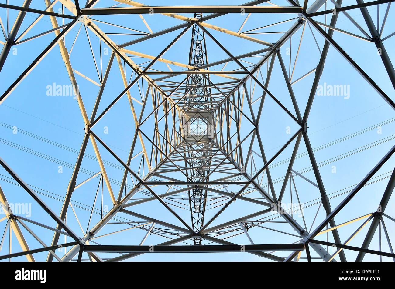 The structure of the power mast seen from the inside Stock Photo - Alamy