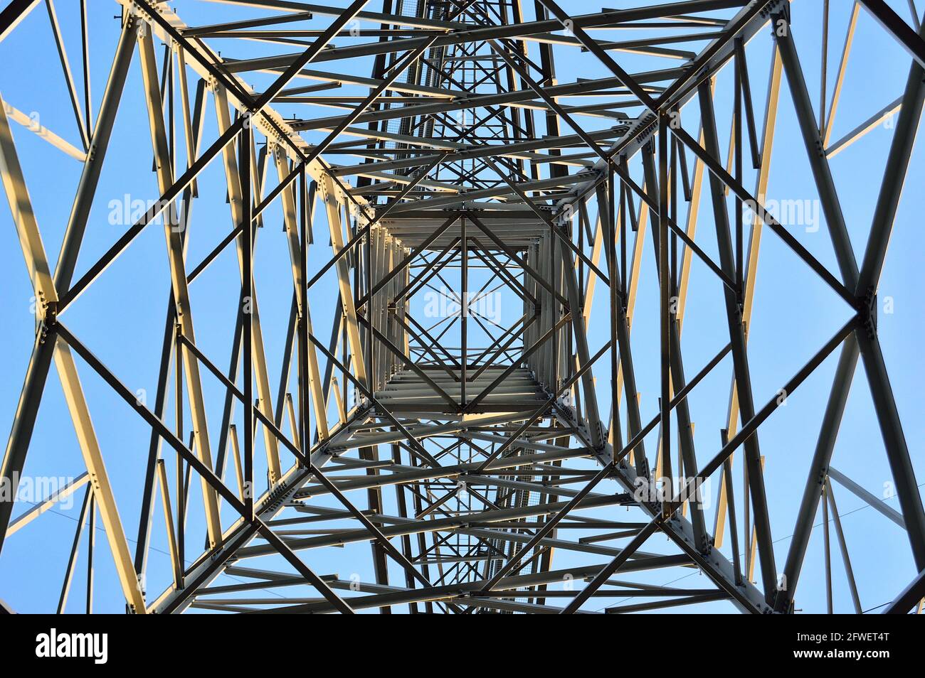 The structure of the power mast seen from the inside Stock Photo - Alamy