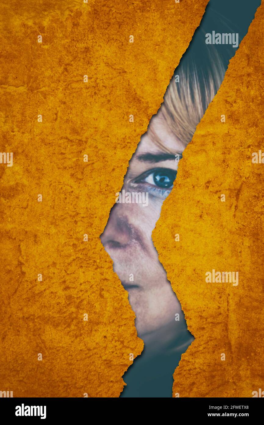 ripped paper and blonde woman peeking from behind it Stock Photo - Alamy