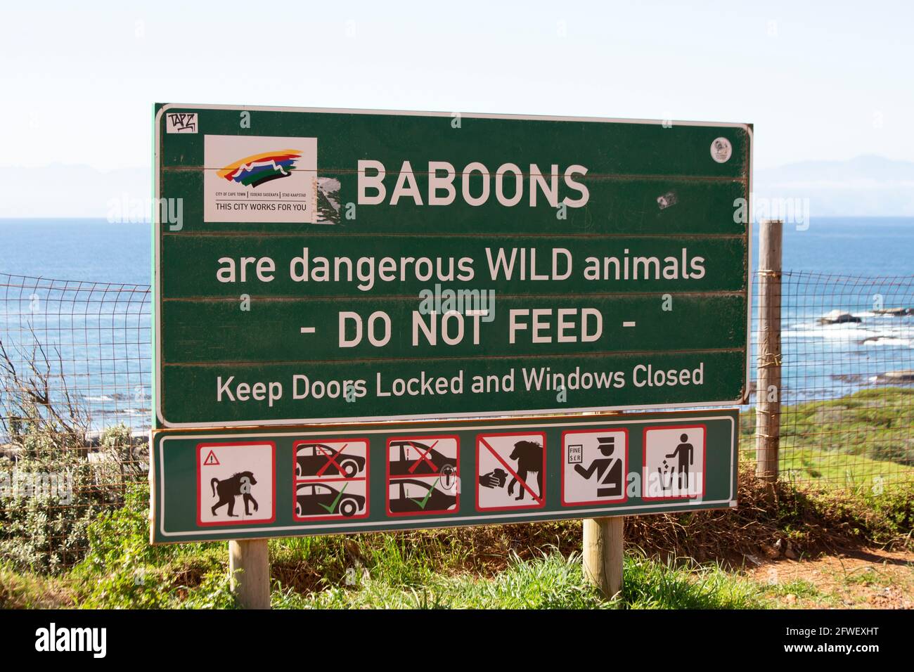 Sign warning visitors against feeding baboons, Western Cape, South ...