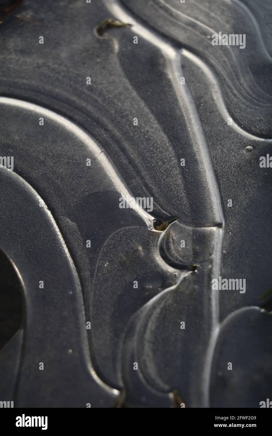 natural abstract pattern in ice over a puddle Stock Photo - Alamy