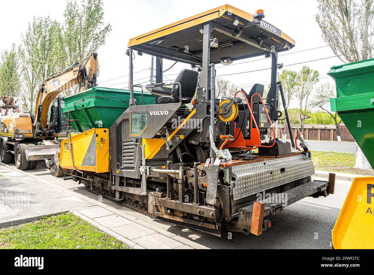 Samara, Russia - May 10, 2021: Volvo asphalt paver machine on the road ...
