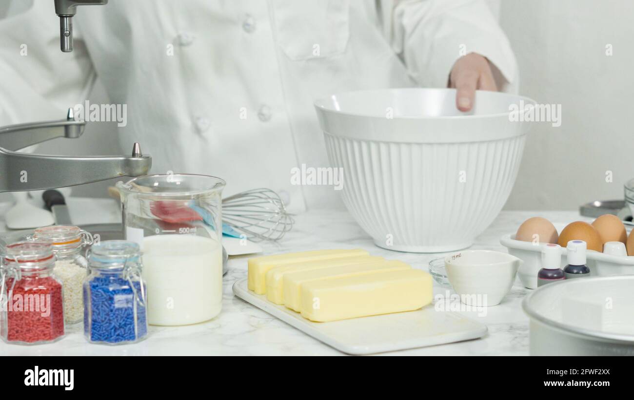 Step by step. Mixing ingredients in standing kitchen mixer to bake a ...