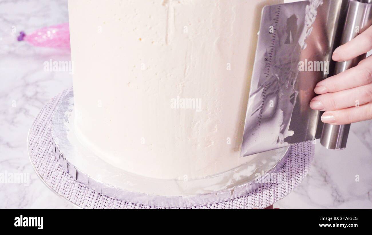 Step by step. Frosting round funfetti cake with white italian ...