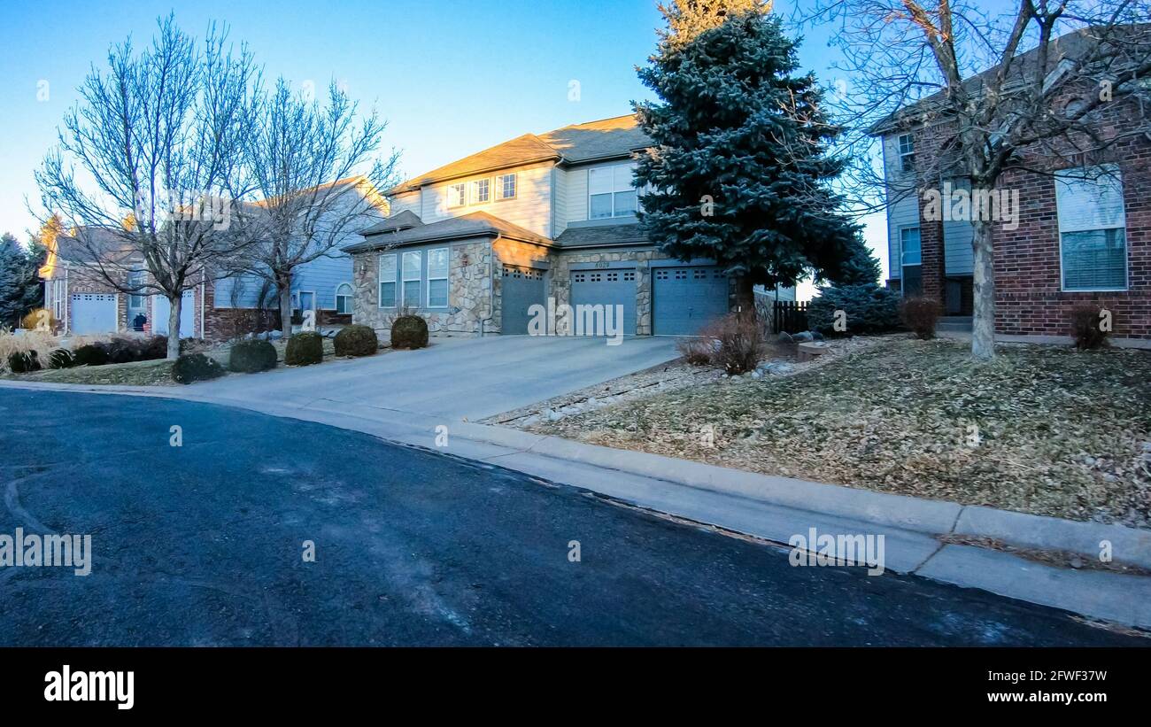 Driving on typical paved roads in a suburban upscale residential ...