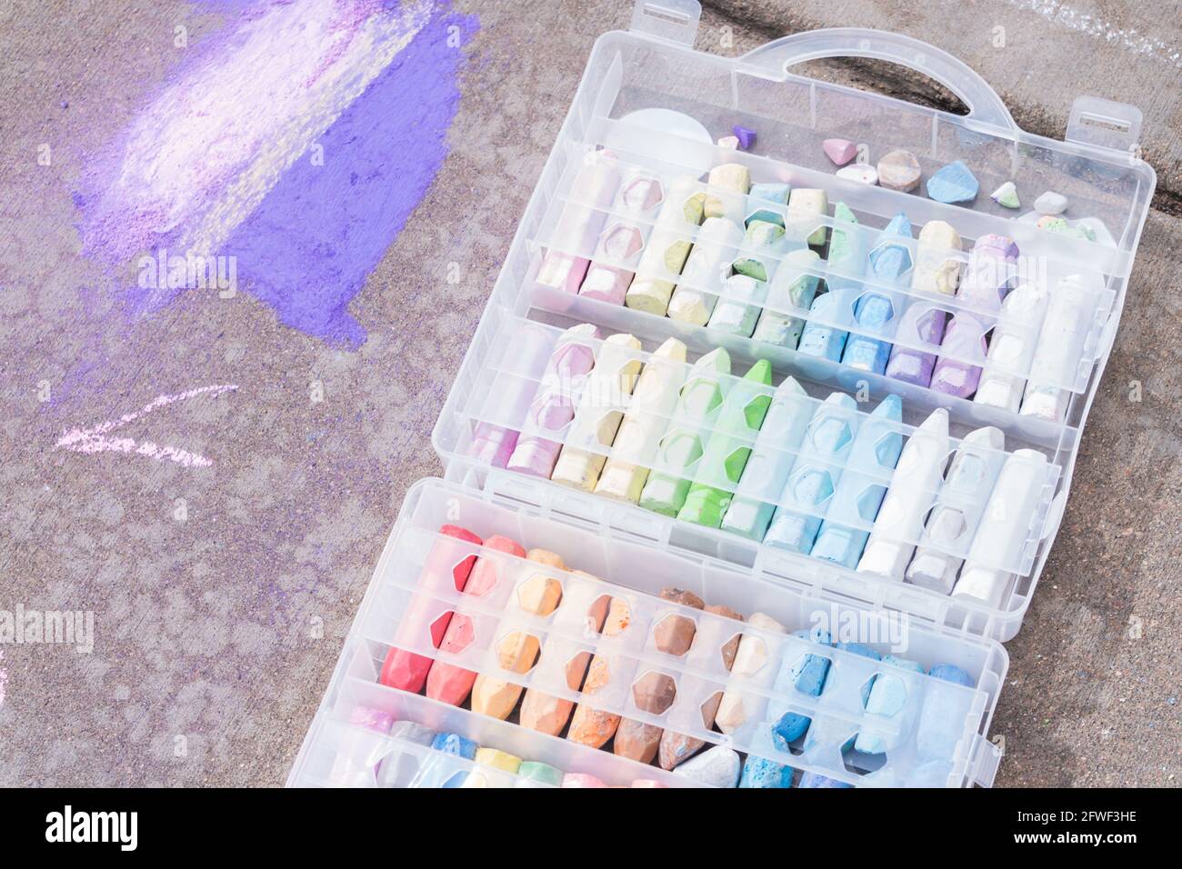 Colorful sidewalk chalk in the box Stock Photo - Alamy