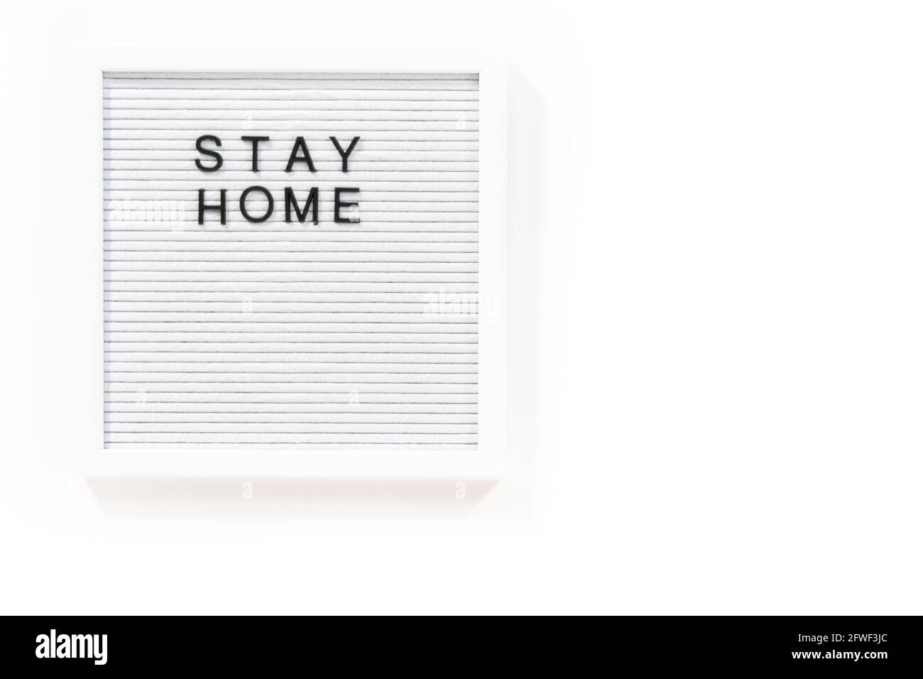 STAY HOME sign on message board Stock Photo - Alamy
