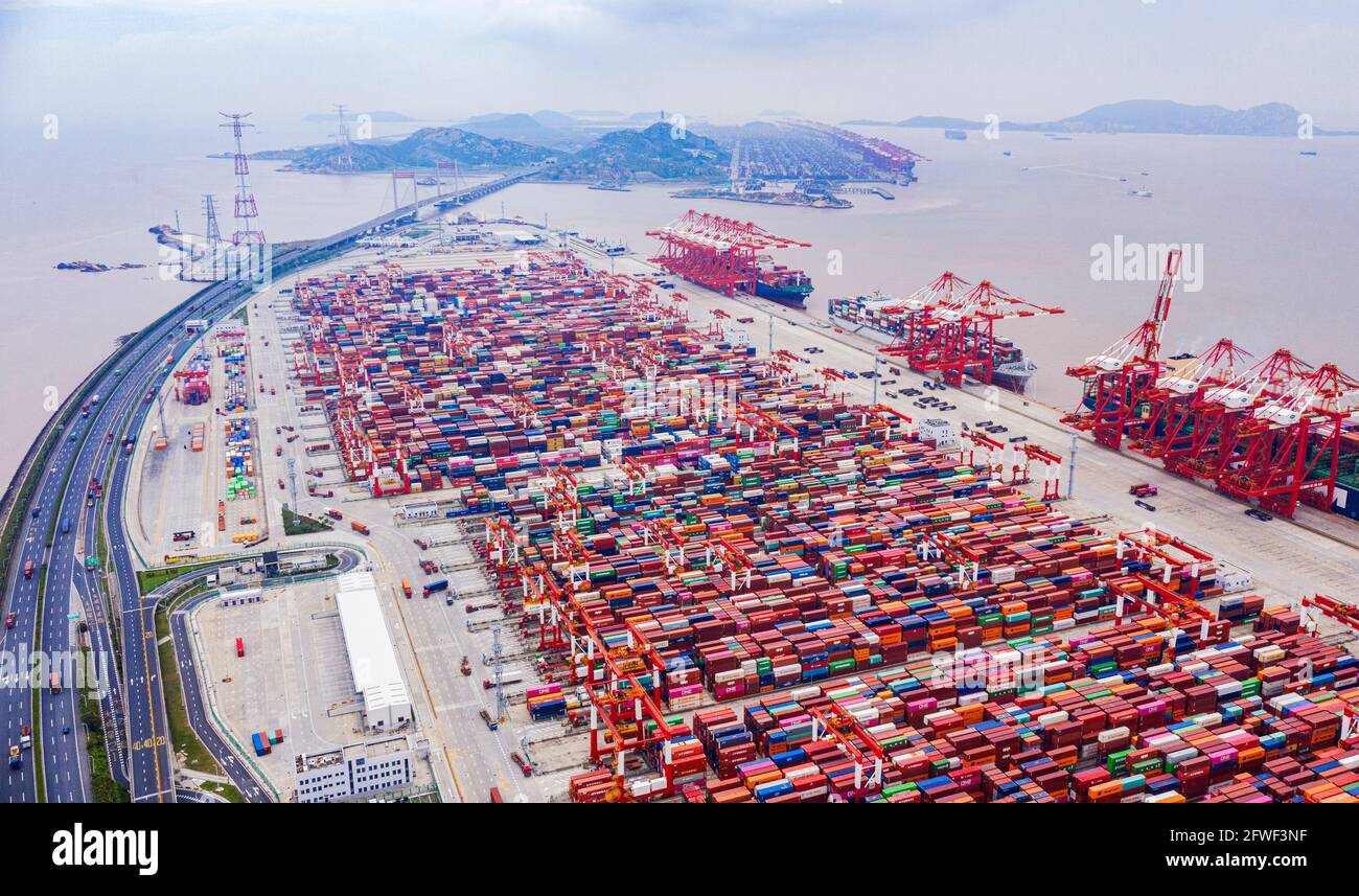 SHANGHAI, CHINA - MAY 21, 2021 - A number of large container ships load ...