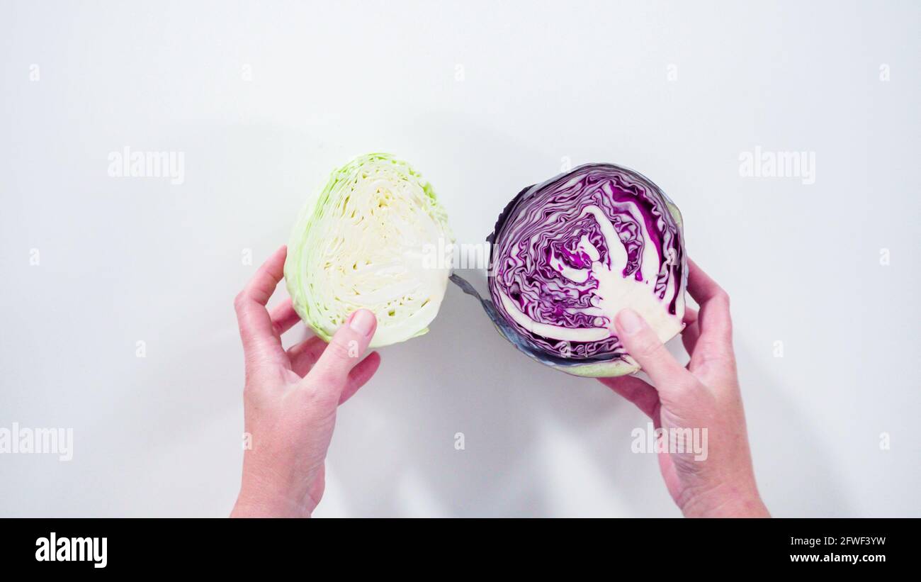 Flat lay. Step by step. Organic green and purple cabbage on a white ...