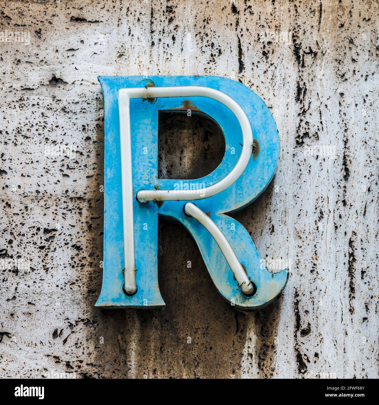 Old neon letter R in turquoise colour Stock Photo - Alamy