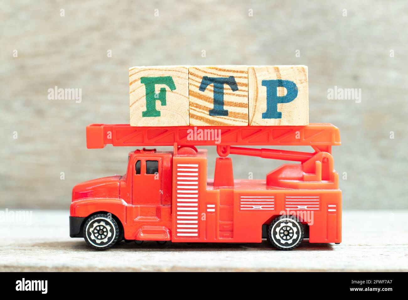Fire ladder truck hold letter block in word FTP (Abbreviation of File ...