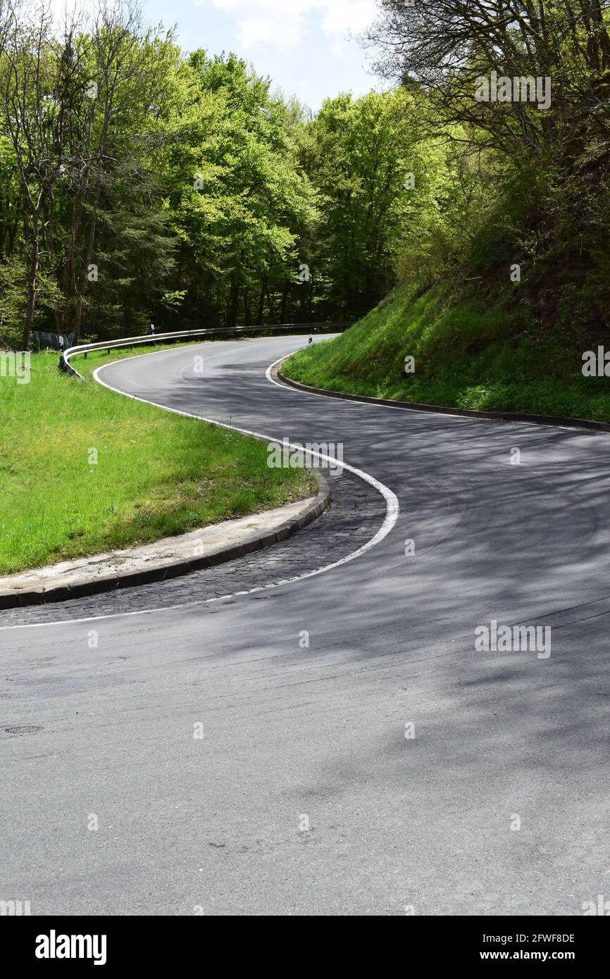 Twisted asphalt road in hi-res stock photography and images - Alamy