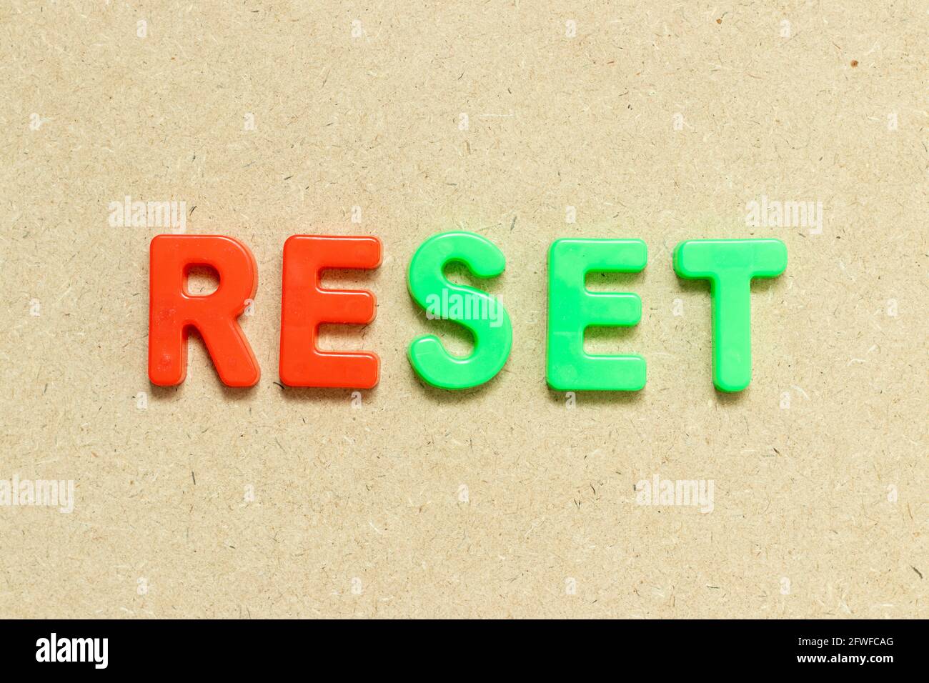 Color alphabet letter with word reset on wood background Stock Photo ...