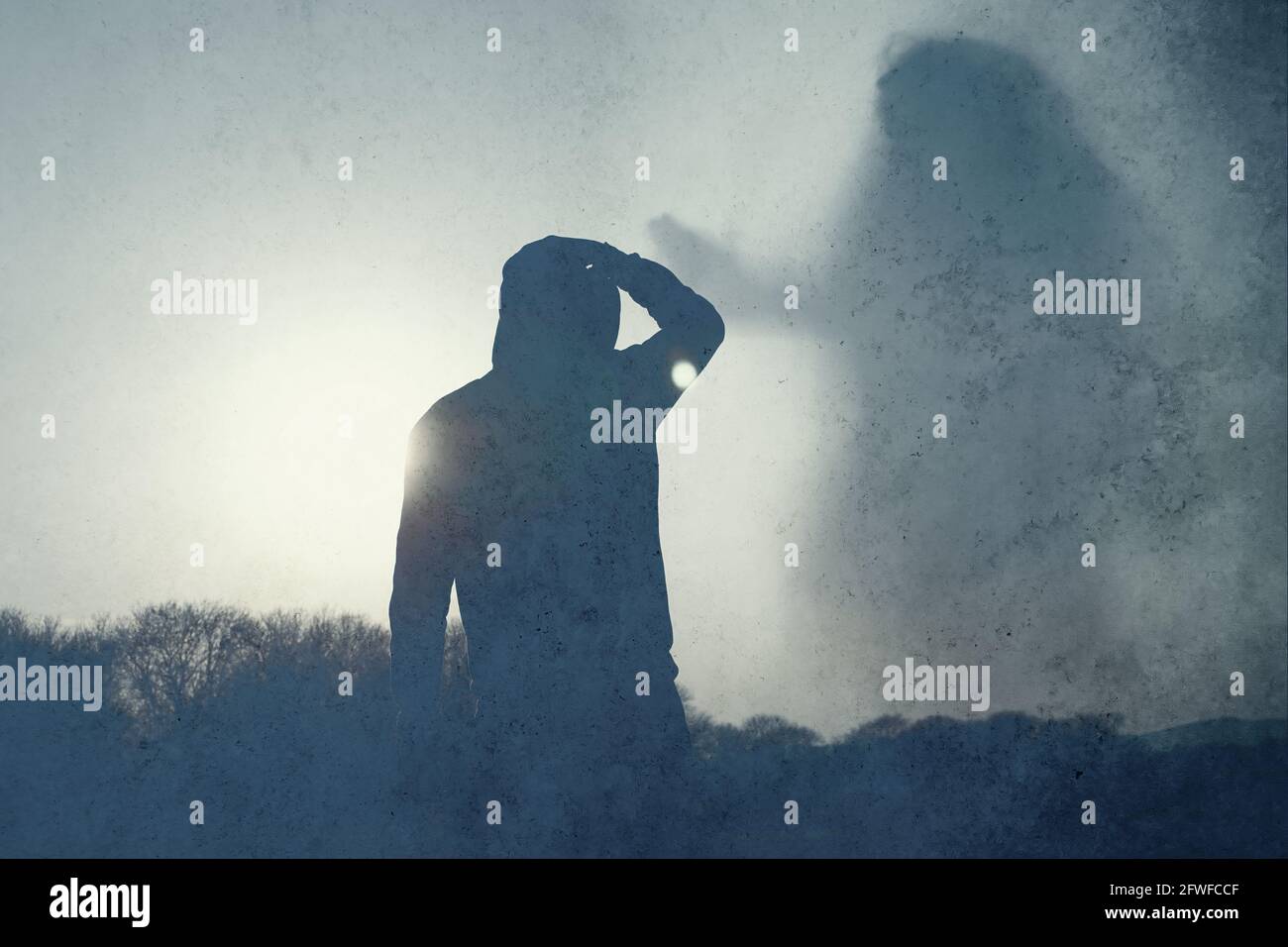 Hooded female figure shadow hi-res stock photography and images - Alamy