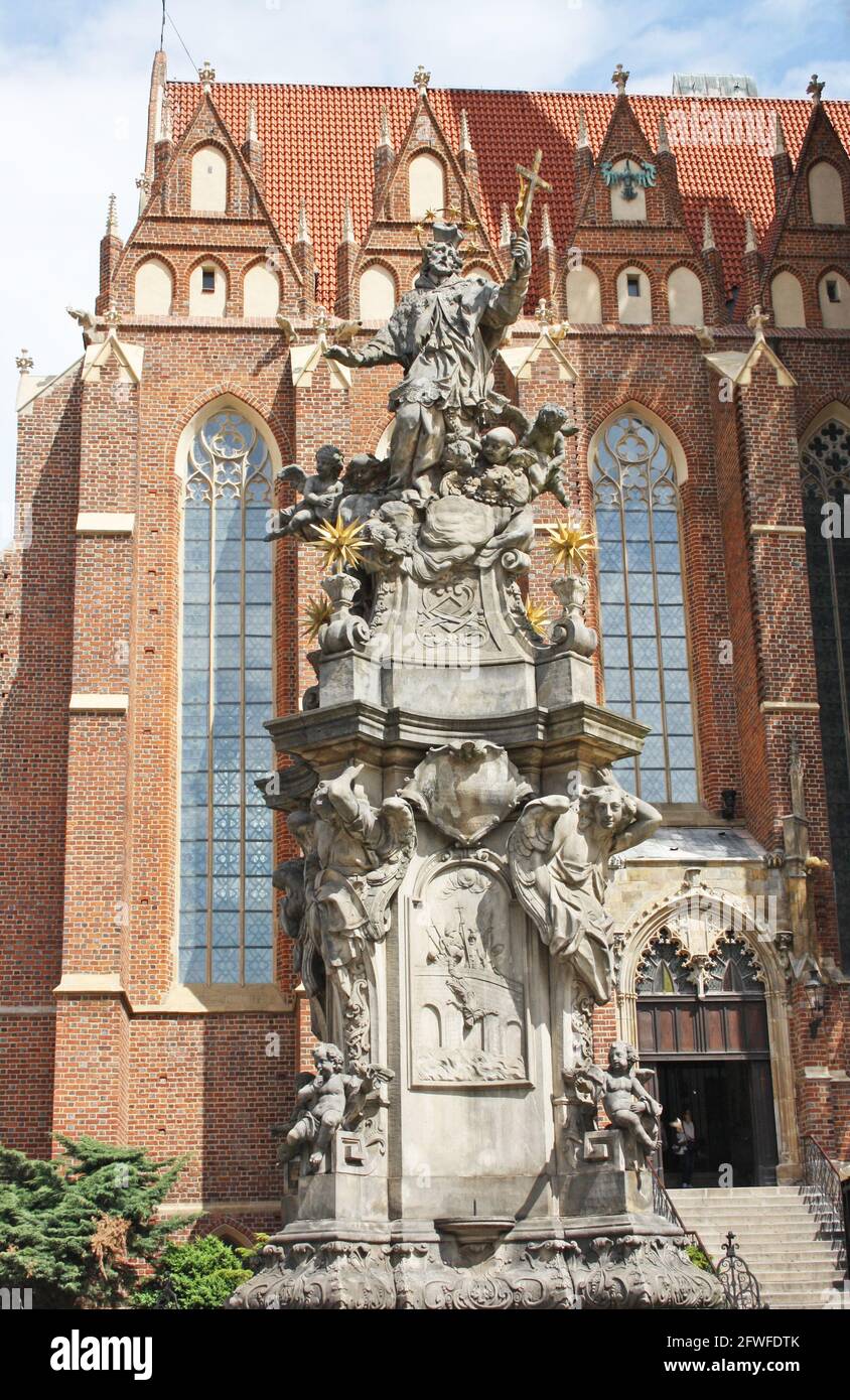 The soaring gothic windows and massive buttresses of the church of the ...